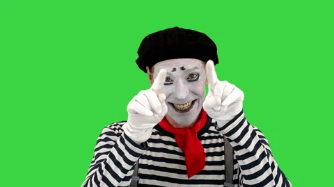 Mime showing his love to camera on a Gre... | Stock Video | Pond5