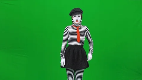 Mime woman is having call, talking. Gree... | Stock Video | Pond5