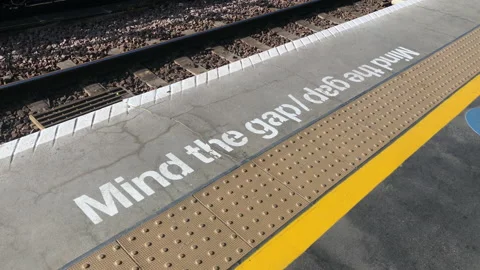 Mind the gap platform floor safety sign ... | Stock Video | Pond5