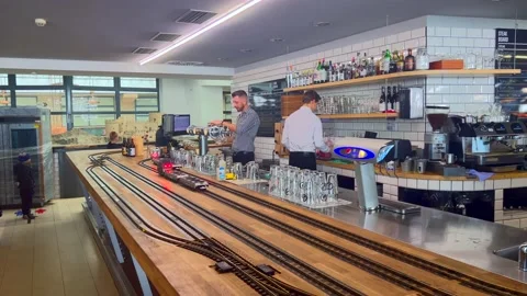 Mini trains on bar counter of Vytopna Ra... | Stock Video | Pond5