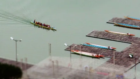 Miniature Rowing Boat arriving at Pier a... | Stock Video | Pond5