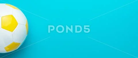 Photograph: Minimalist photo of soccer ball over turquoise blue ...