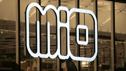 Mio logo on the exterior of a furniture ... | Stock Video | Pond5