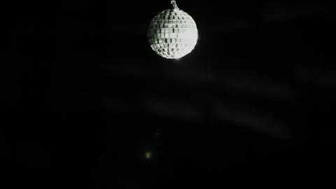 Mirror ball rotating on a dark backgroun... | Stock Video | Pond5