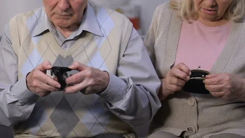 Miserable old couple showing empty purse... | Stock Video | Pond5