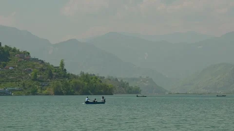 Misty Hills and Rowing Boats, Serene Oce... | Stock Video | Pond5