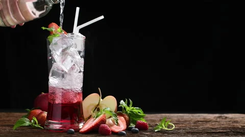 Mixed fruit juice with syrup and soda su... | Stock Video | Pond5