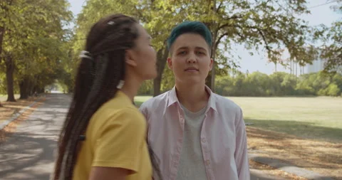 Mixed-race female kissing girlfriend on ... | Stock Video | Pond5