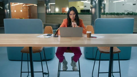 Mixed race girl closing laptop, going aw... | Stock Video | Pond5