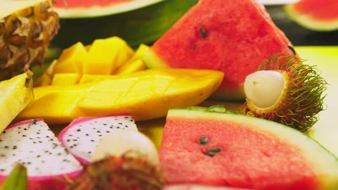 Mixed tropical fruits, closeup. fresh fr... | Stock Video | Pond5
