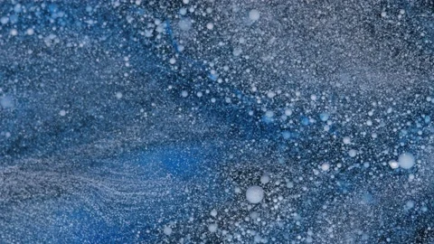 Mixing of blue and white colors in spots... | Stock Video | Pond5