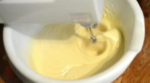 mixing cake mixture with a blender | Stock Video | Pond5