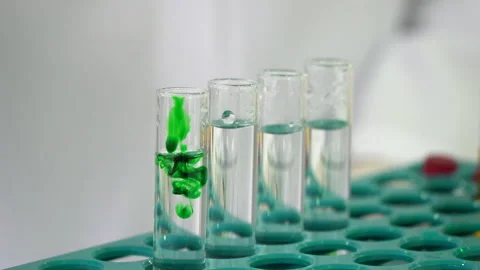 mixing chemicals in laboratory, testing ... | Stock Video | Pond5