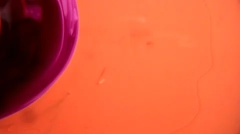 Mixing colorful fluids in water creating... | Stock Video | Pond5