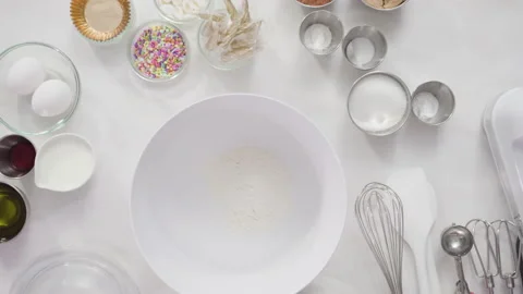 Mixing ingredients together in a white m... | Stock Video | Pond5