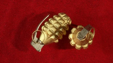 MK2 hand grenades. Two golden pineapple ... | Stock Video | Pond5
