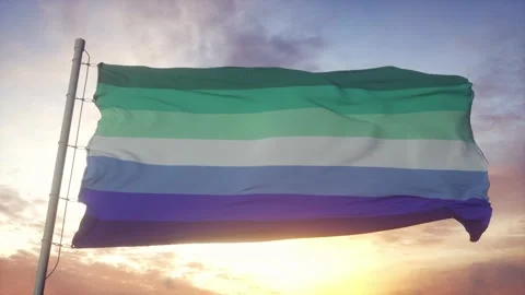 MLM pride flag waving in the wind, sky a... | Stock Video | Pond5