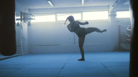 MMA female fighter exercising in gym, tr... | Stock Video | Pond5