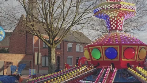 Mobile amusement park setup brings joy t... | Stock Video | Pond5