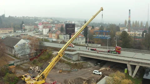 Mobile crane loading bridge segment onto... | Stock Video | Pond5