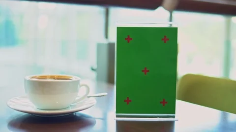Mock up green screen signboard on table ... | Stock Video | Pond5