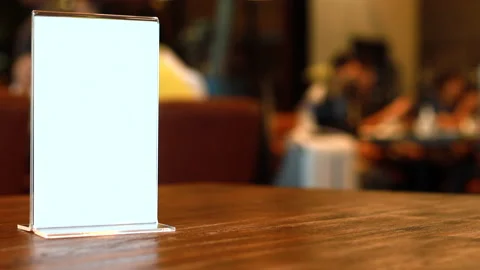 Mock up Menu frame standing on wood tabl... | Stock Video | Pond5