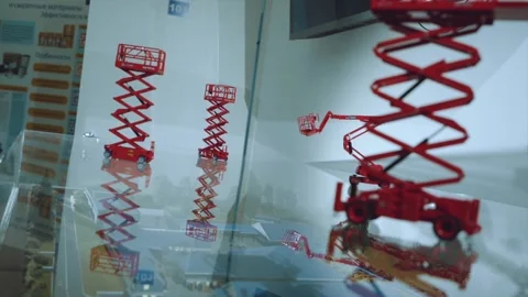 A mock-up of a scissor loader, a smaller... | Stock Video | Pond5