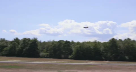 Model airplane landing on runway | Stock Video | Pond5