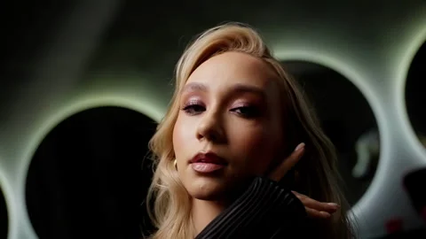 Model in a makeup studio with elegant ma... | Stock Video | Pond5