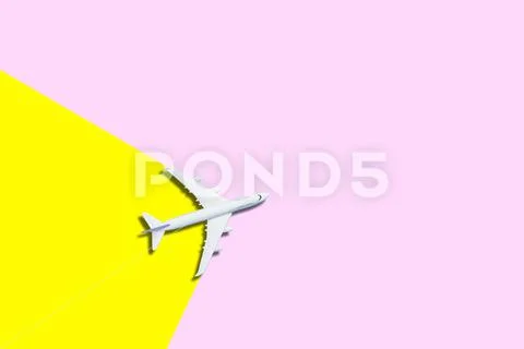 Photograph: Model plane, airplane on pastel color background. Flat lay ...