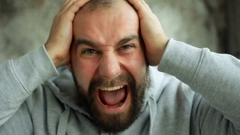 Model released man in studio screaming, ... | Stock Video | Pond5