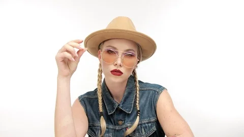 models in hat with two braids and glasse... | Stock Video | Pond5