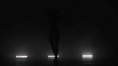 Modern ballet dancer performing on dark ... | Stock Video | Pond5
