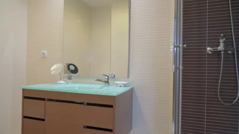 Modern bathroom with shower cubicle in a... | Stock Video | Pond5