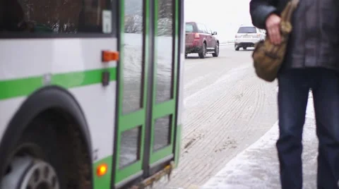Modern city bus arrive to bus stop, pass... | Stock Video | Pond5
