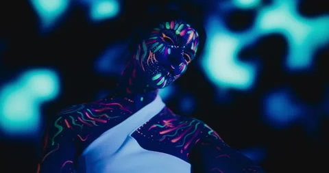 Modern Dancer with Neon Body Paint | Stock Video | Pond5