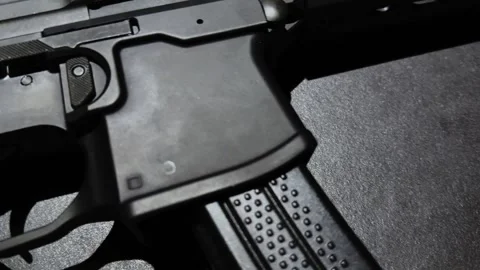 Modern Elegant Assault Rifle on Grey Bac... | Stock Video | Pond5