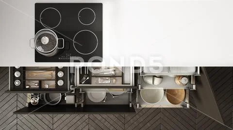 Modern kitchen top view, opened drawers and stove with cooking pan ...