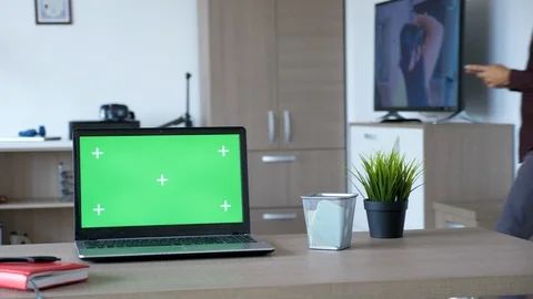 Modern laptop with an isolated green scr... | Stock Video | Pond5