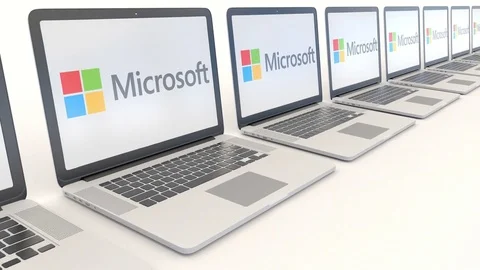Modern laptops with Microsoft logo. Comp... | Stock Video | Pond5