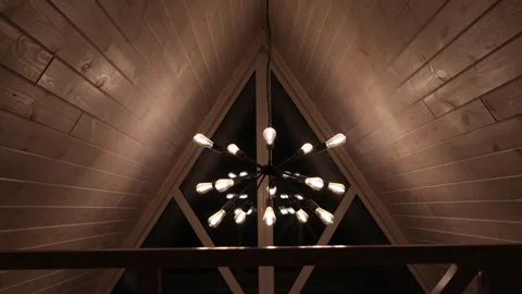 Modern loft-style lump in living room | Stock Video | Pond5