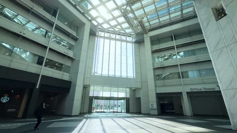 Modern office lobby with high ceilings a... | Stock Video | Pond5