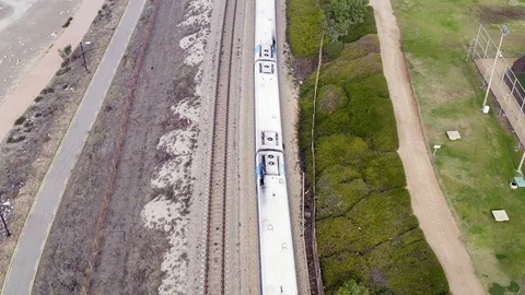 Modern passenger Train crossing the fram... | Stock Video | Pond5