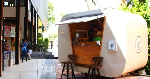Modern Pop Up Cafe and Stalls Outside Sh... | Stock Video | Pond5