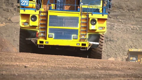 The modern quarry truck drives through t... | Stock Video | Pond5