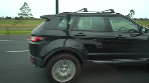 Modern Range Rover driving in highway, s... | Stock Video | Pond5