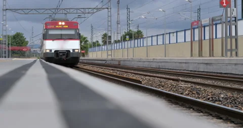 Modern red train entering empty station ... | Stock Video | Pond5