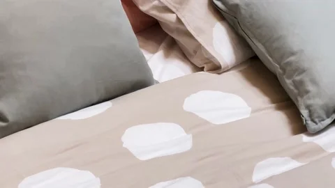 Modern style bedding on bed in bedroom, ... | Stock Video | Pond5