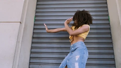 Modern style dancer with afro on her hea... | Stock Video | Pond5