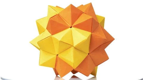 Modular origami figure on white backgrou... | Stock Video | Pond5
